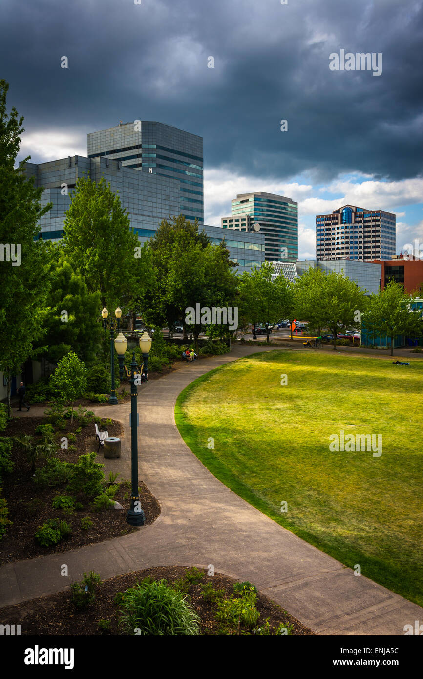 Walkway at Tom McCall Waterfront Park and buildings in Portland, Oregon ...