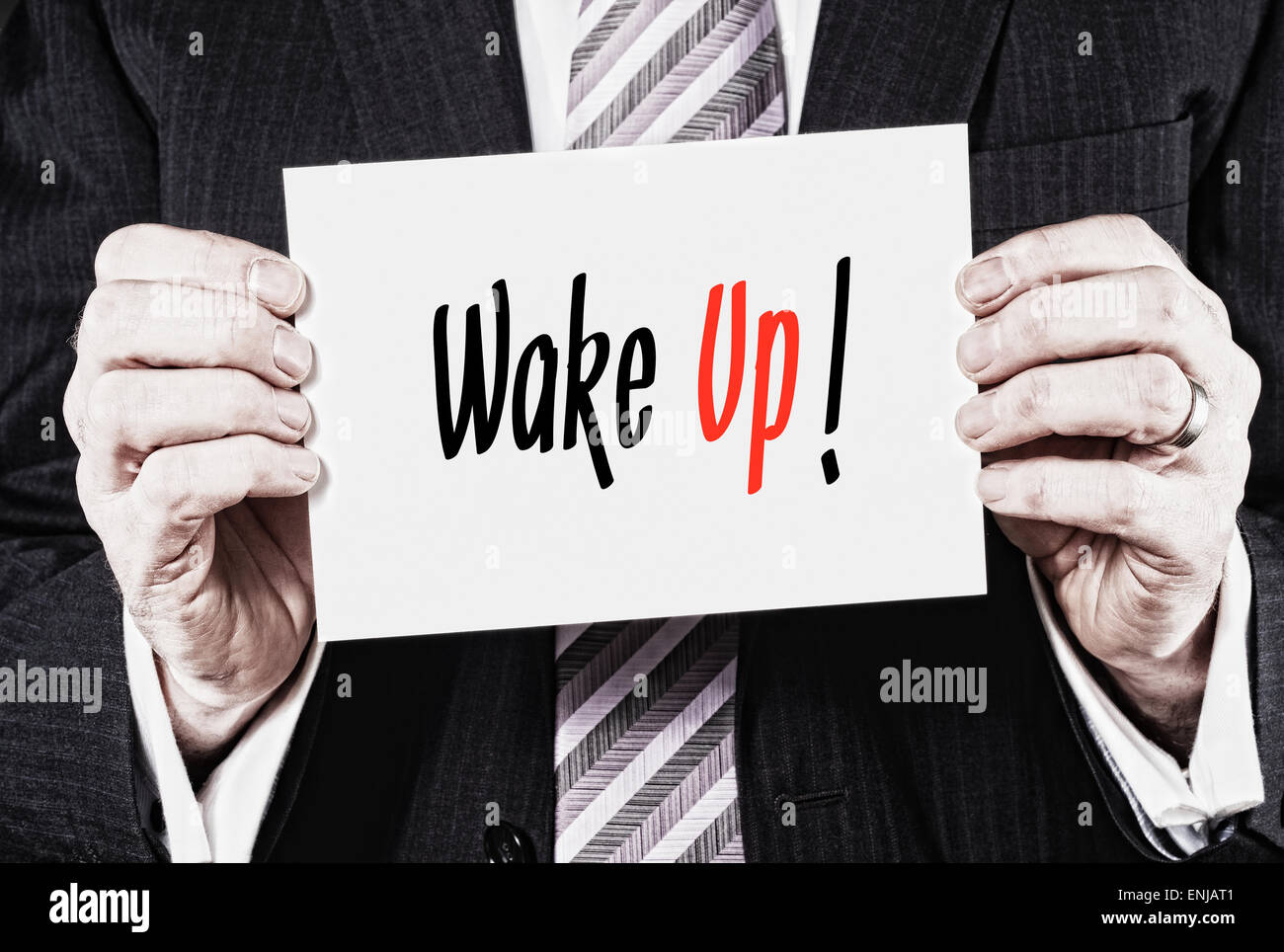 Businessman holding card words wake hi-res stock photography and images ...