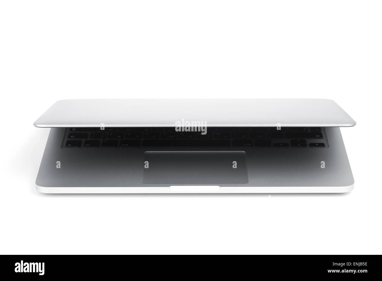 Slightly opened laptop. Isolated on white background Stock Photo - Alamy