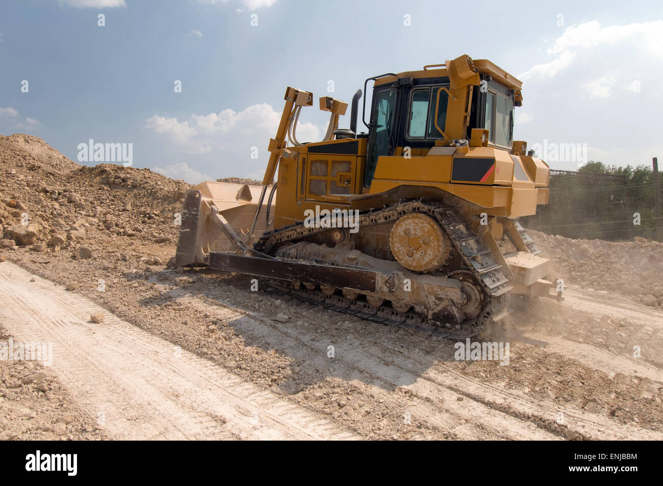 loading machine produces crushed stone for a career Stock Photo - Alamy