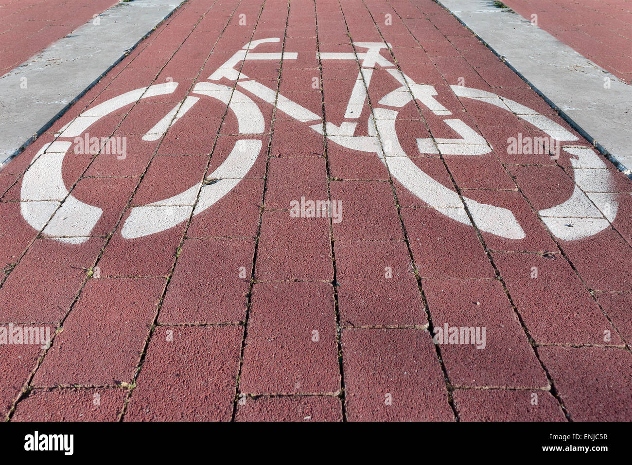 Cycling track with a drawing of a bicycle Stock Photo - Alamy