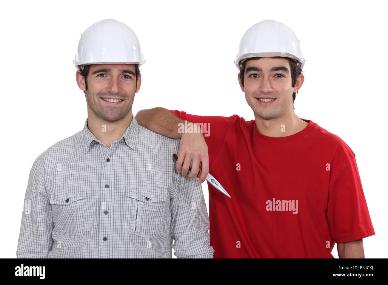 duo of craftsmen all smiles Stock Photo - Alamy