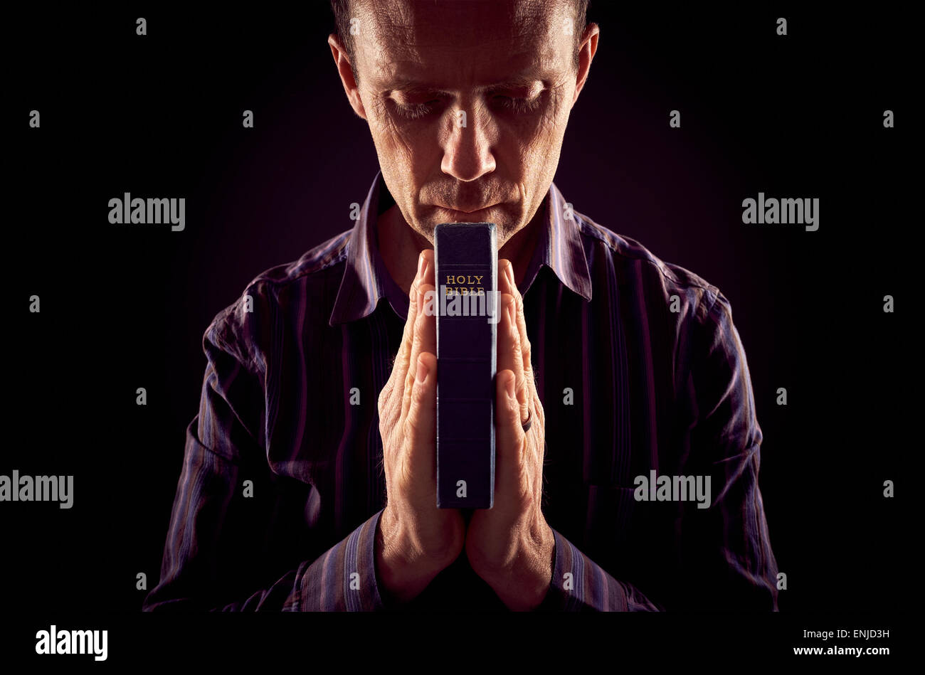 Front view man praying in hi-res stock photography and images - Alamy