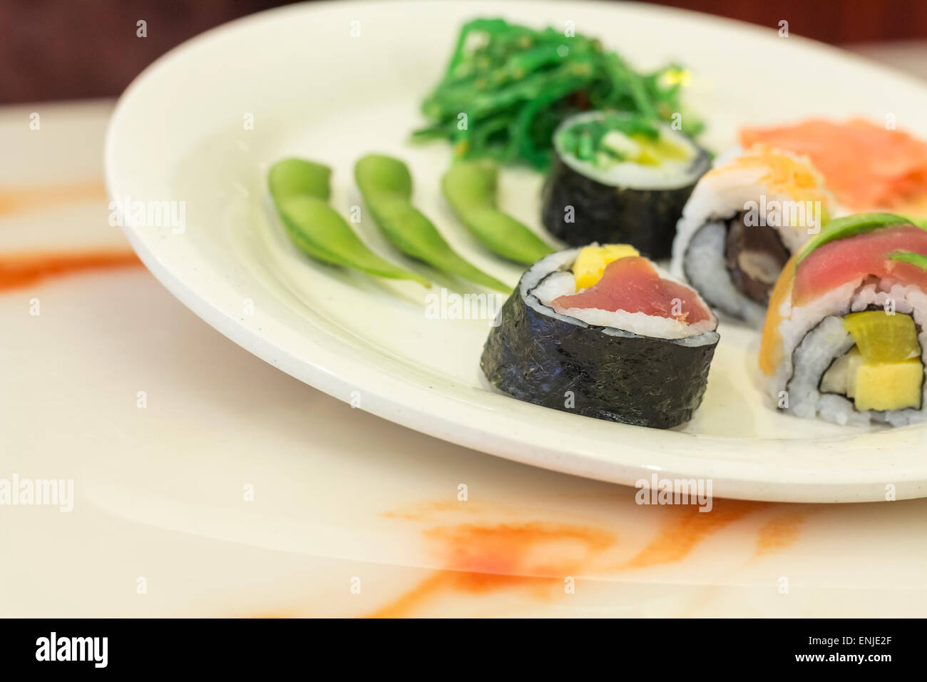 Assorted plate of Japanese sushi demonstrating variety including ...