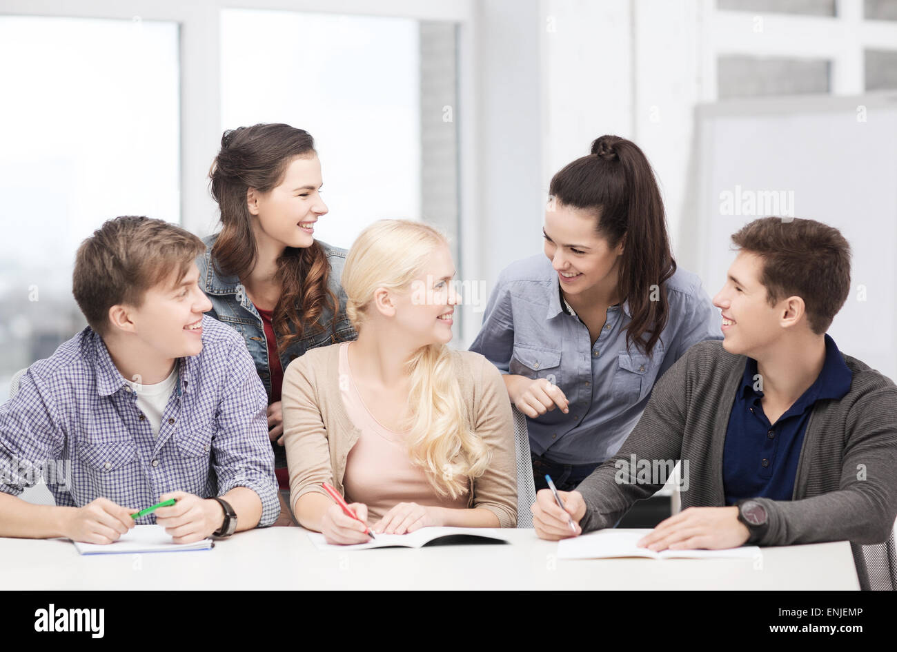 students having discussion at school Stock Photo - Alamy