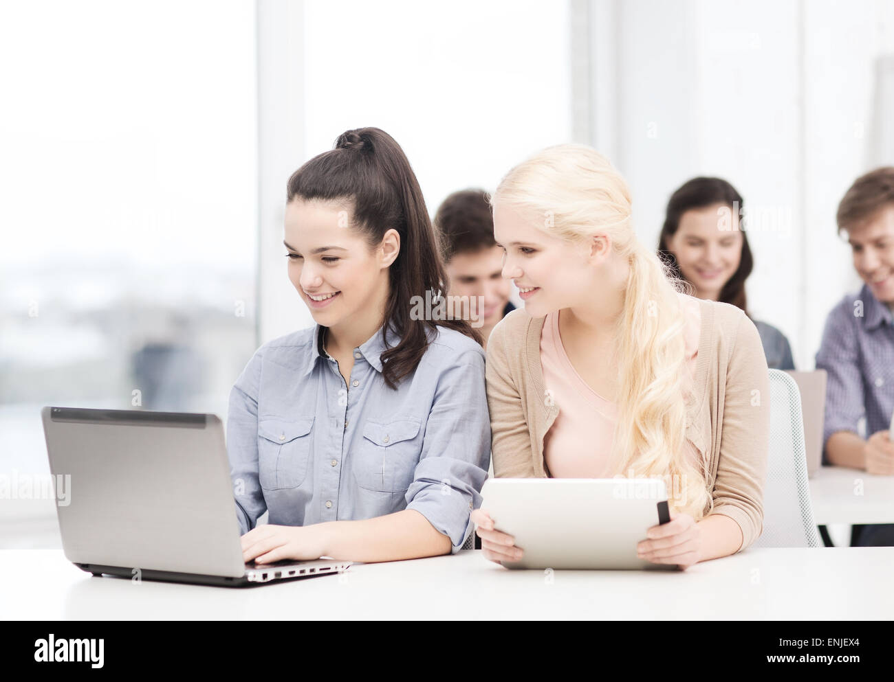 students with laptop, tablet pc and notebooks Stock Photo - Alamy