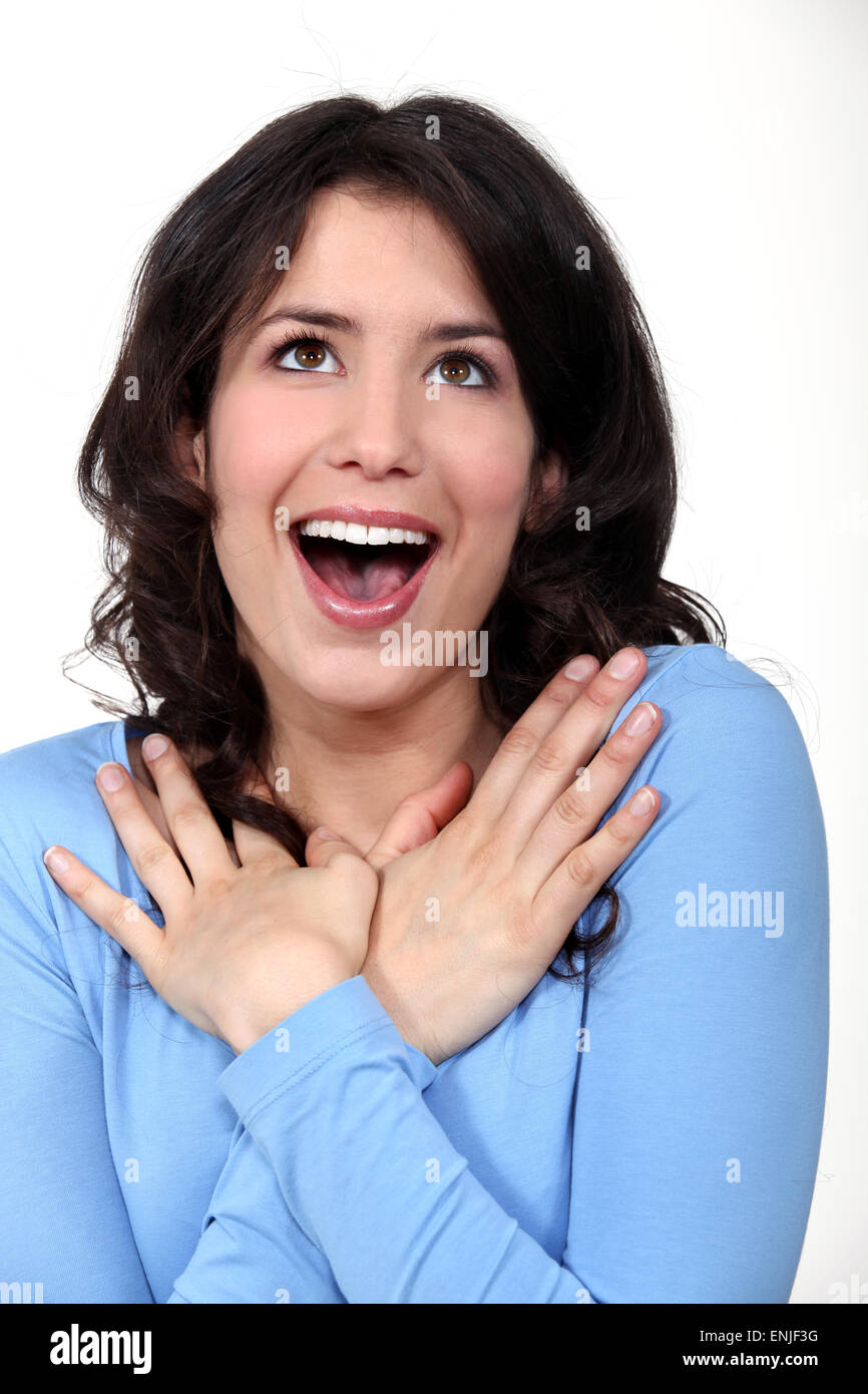Ecstatic young woman Stock Photo - Alamy