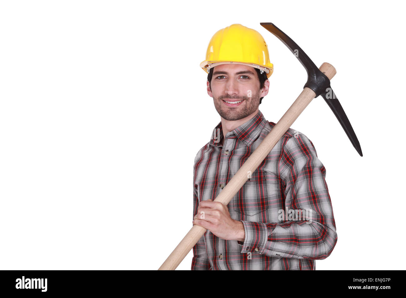 Craftsman holding a pick Stock Photo - Alamy