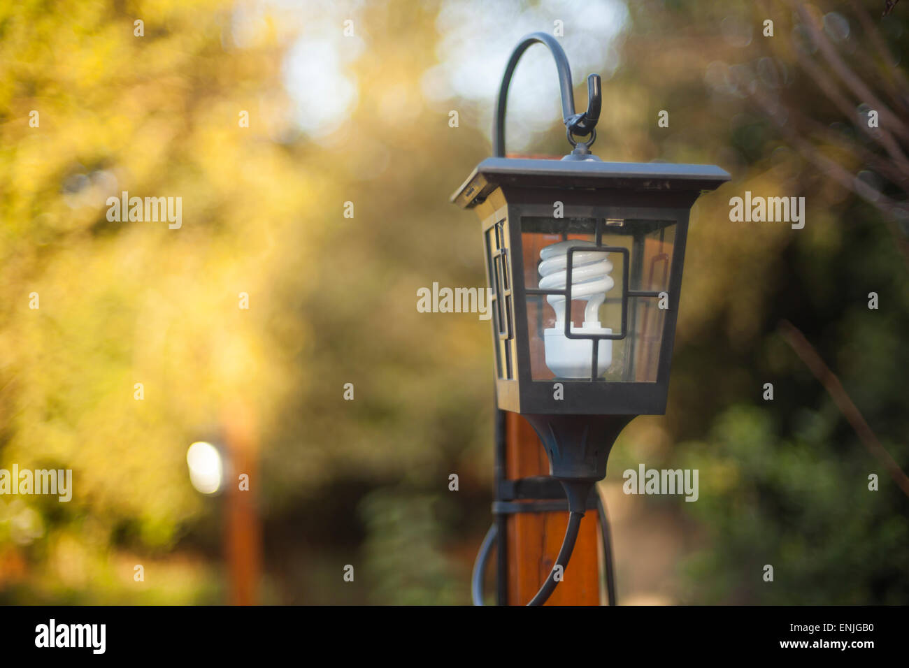 Old wooden lamp post light hi-res stock photography and images - Alamy