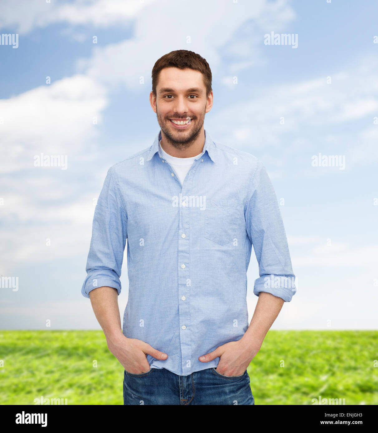 Beautiful man standing smiling hi-res stock photography and images - Alamy