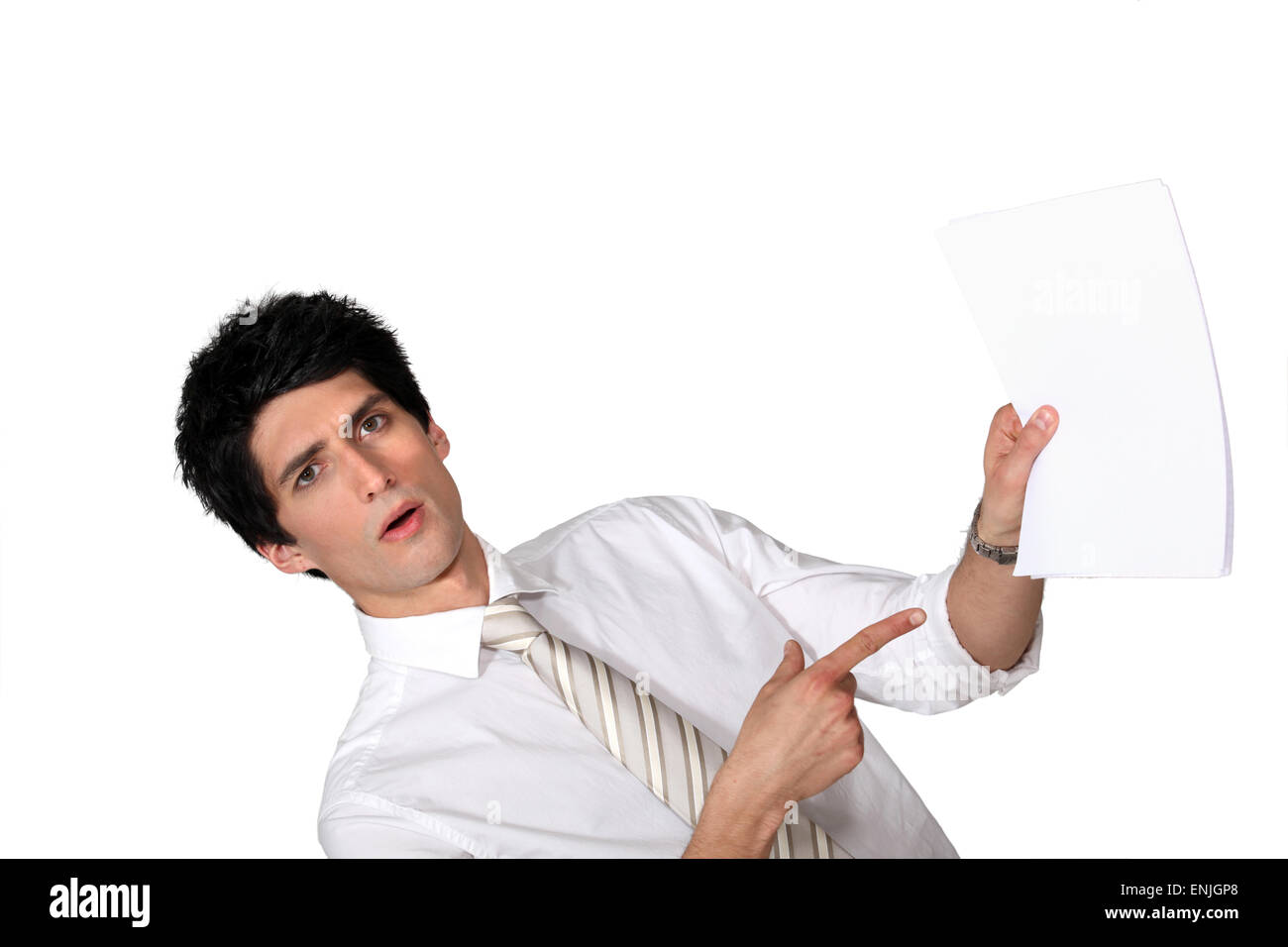Surprised man showing a document Stock Photo - Alamy