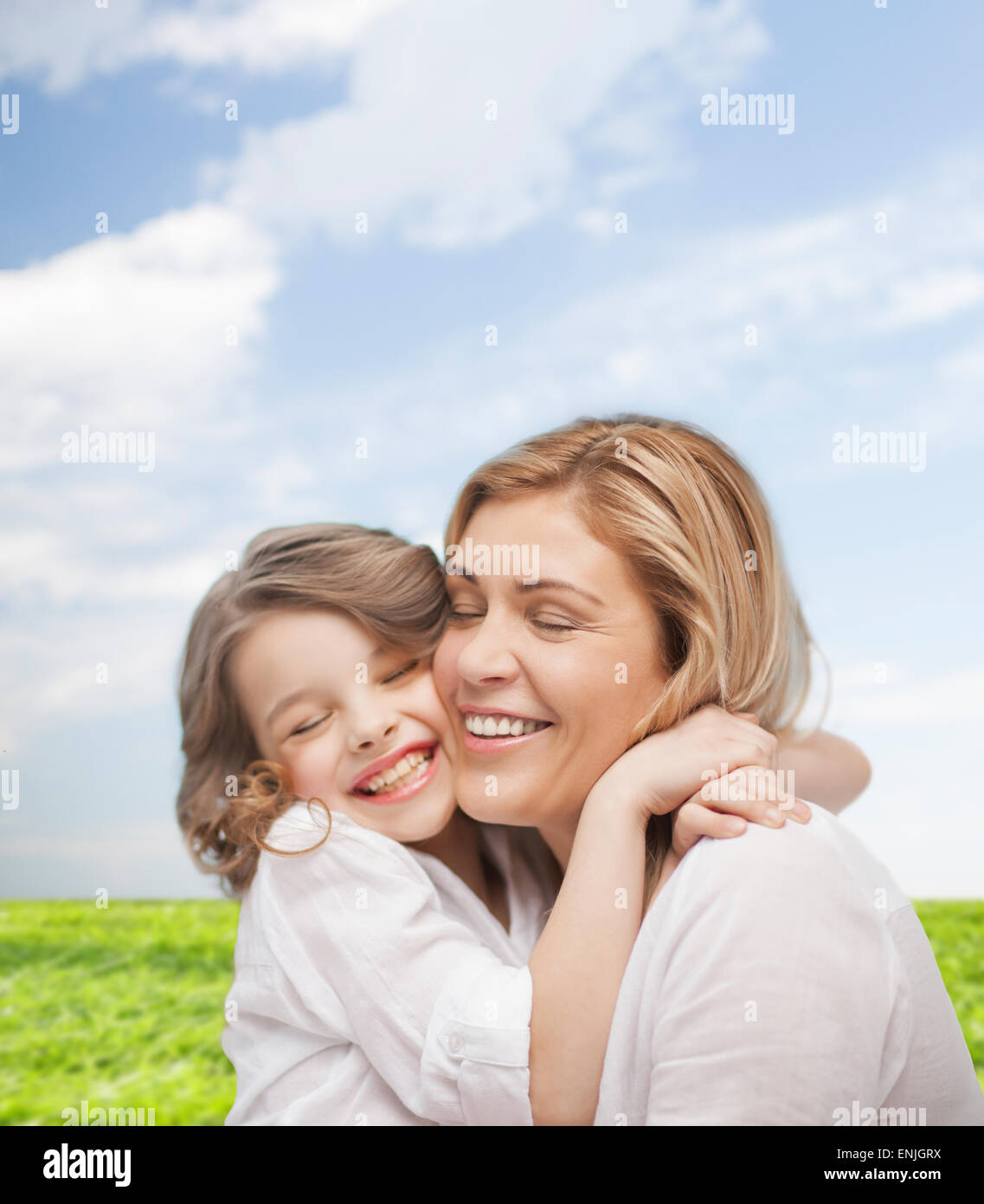 happy mother and daughter hugging Stock Photo - Alamy