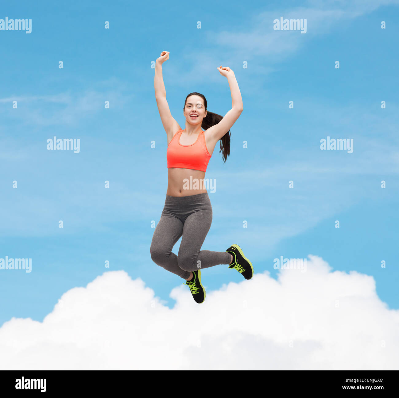 sporty teenage girl jumping in sportswear Stock Photo - Alamy