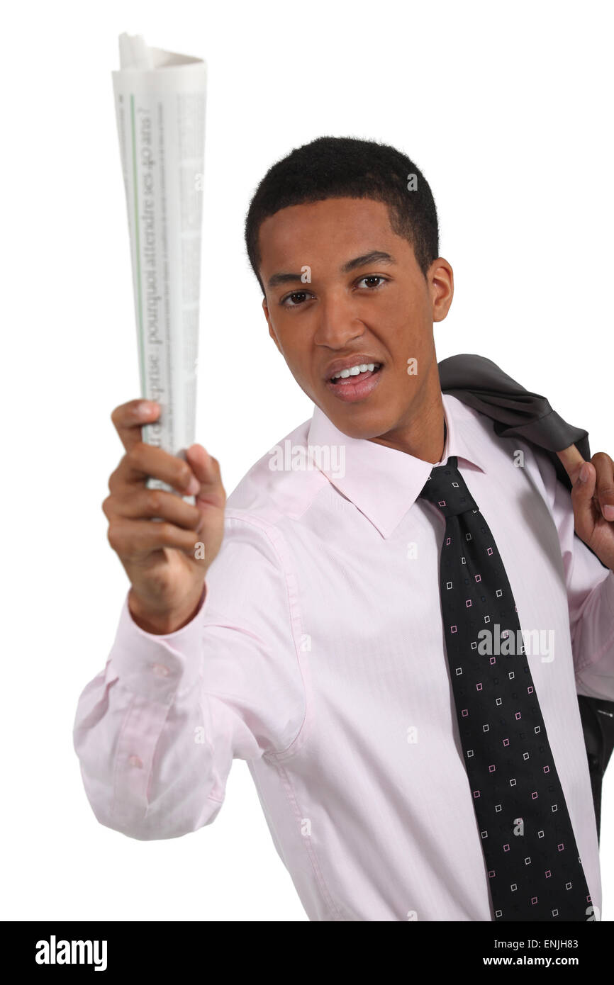 Man with newspaper in hand Stock Photo - Alamy