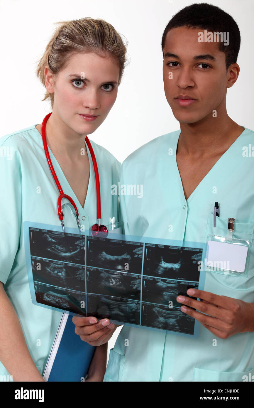 African american doctor examining ray hi-res stock photography and ...