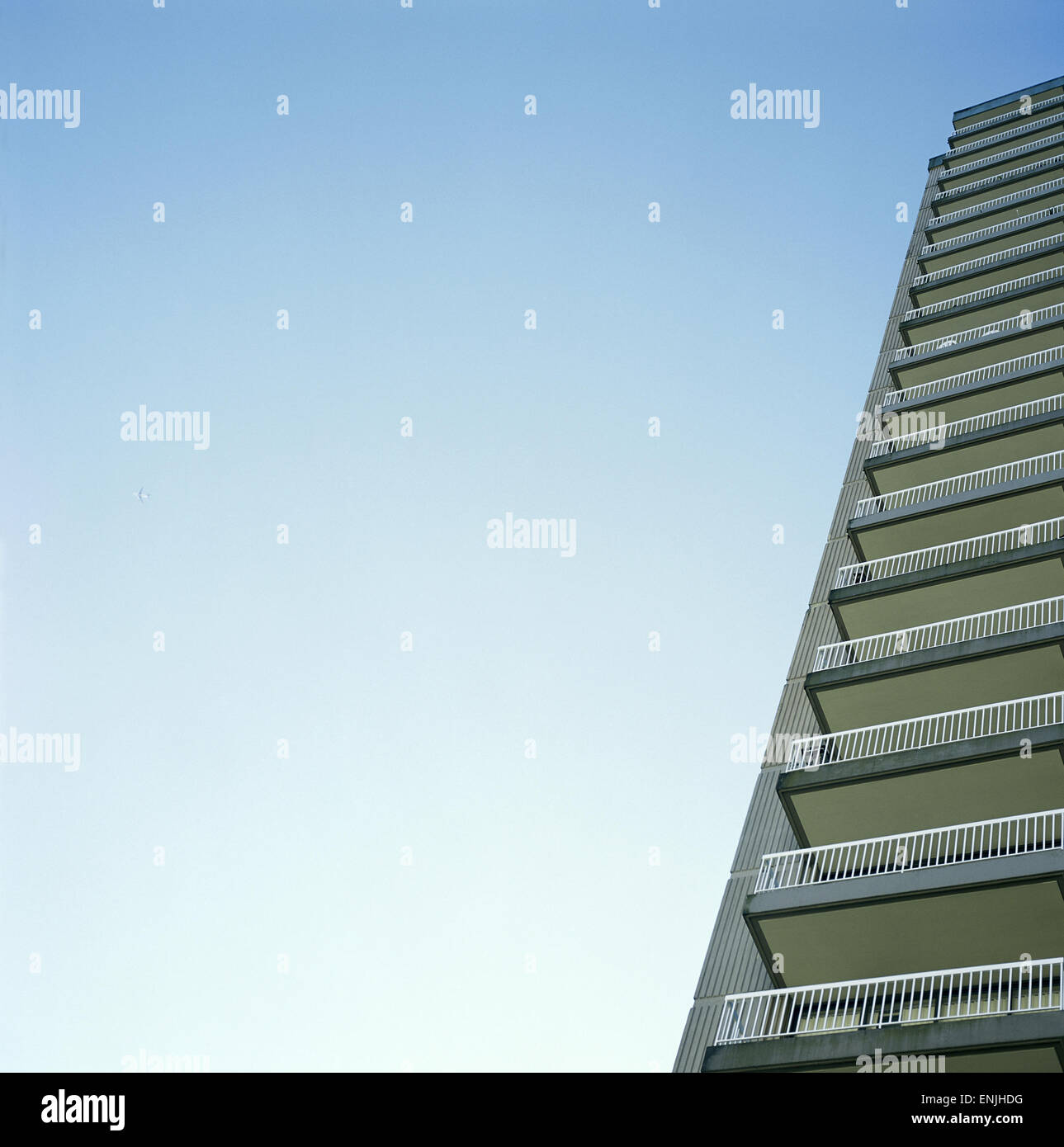 Skyscraper balconies against blue sky Stock Photo - Alamy