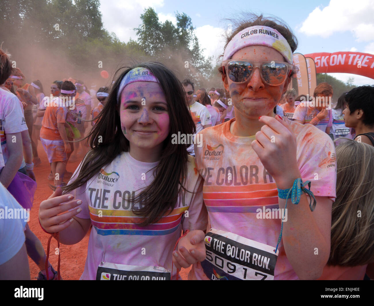 Fun runners taking part in the Dulux Color Run, Manchester UK, in July ...