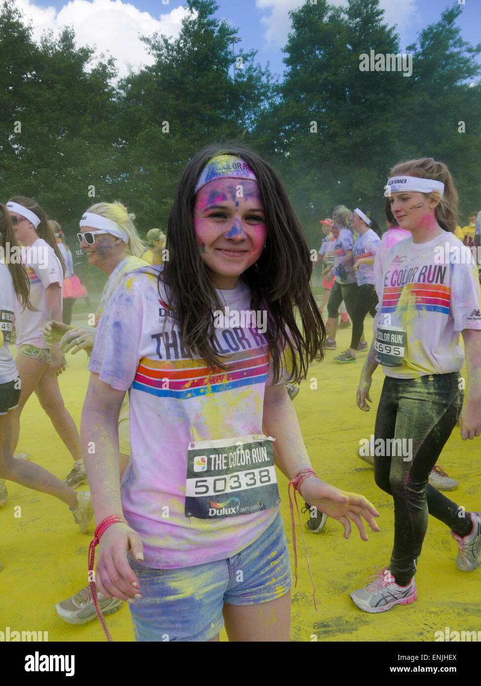 Fun runners taking part in the Dulux Color Run, Manchester UK, in July ...