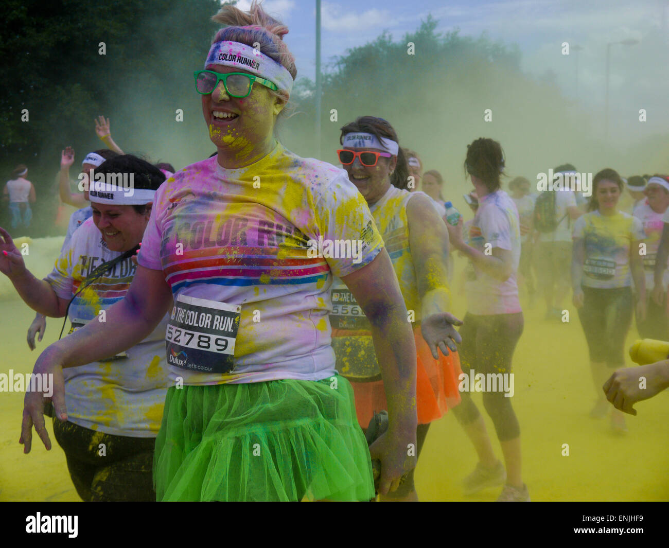 Fun runners taking part in the Dulux Color Run, Manchester UK, in July ...