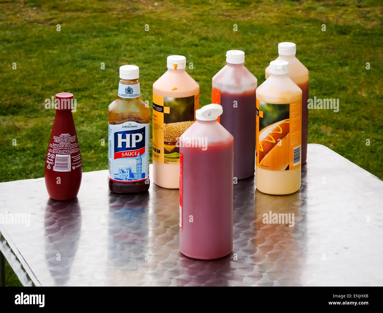 A table full of condiments at a mobile fast food stall Stock Photo - Alamy