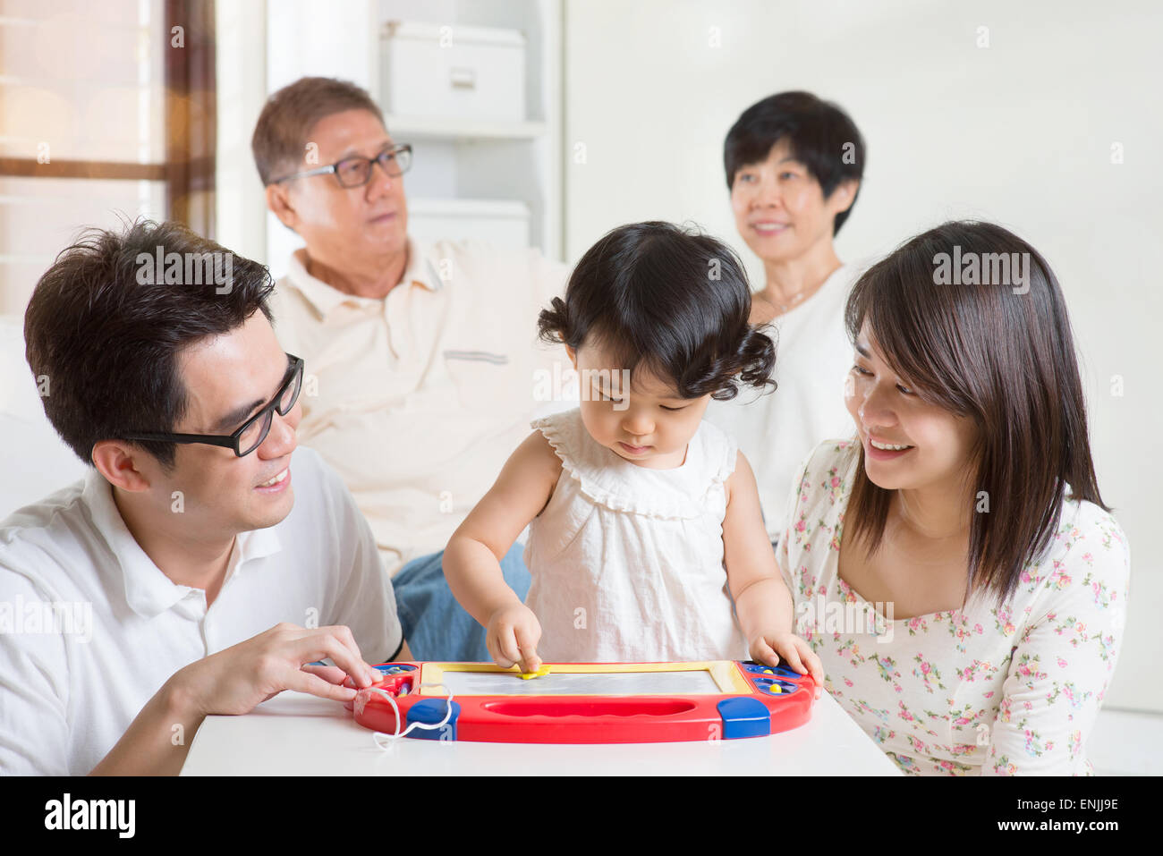 Happy family portrait. Asian multi generations having fun at home Stock ...