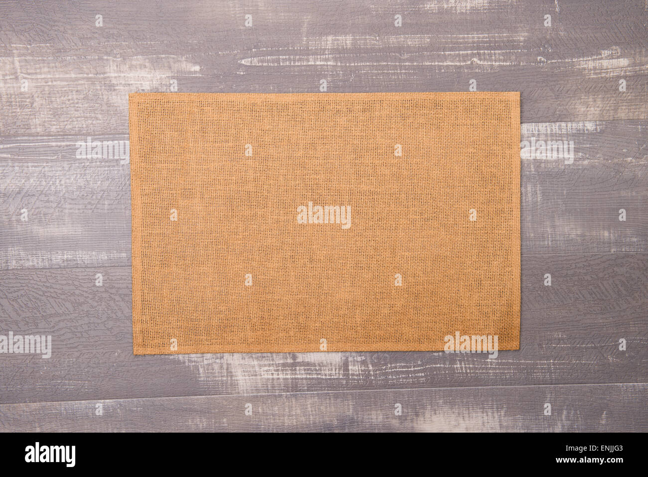 Place mat on wooden deck table Stock Photo - Alamy