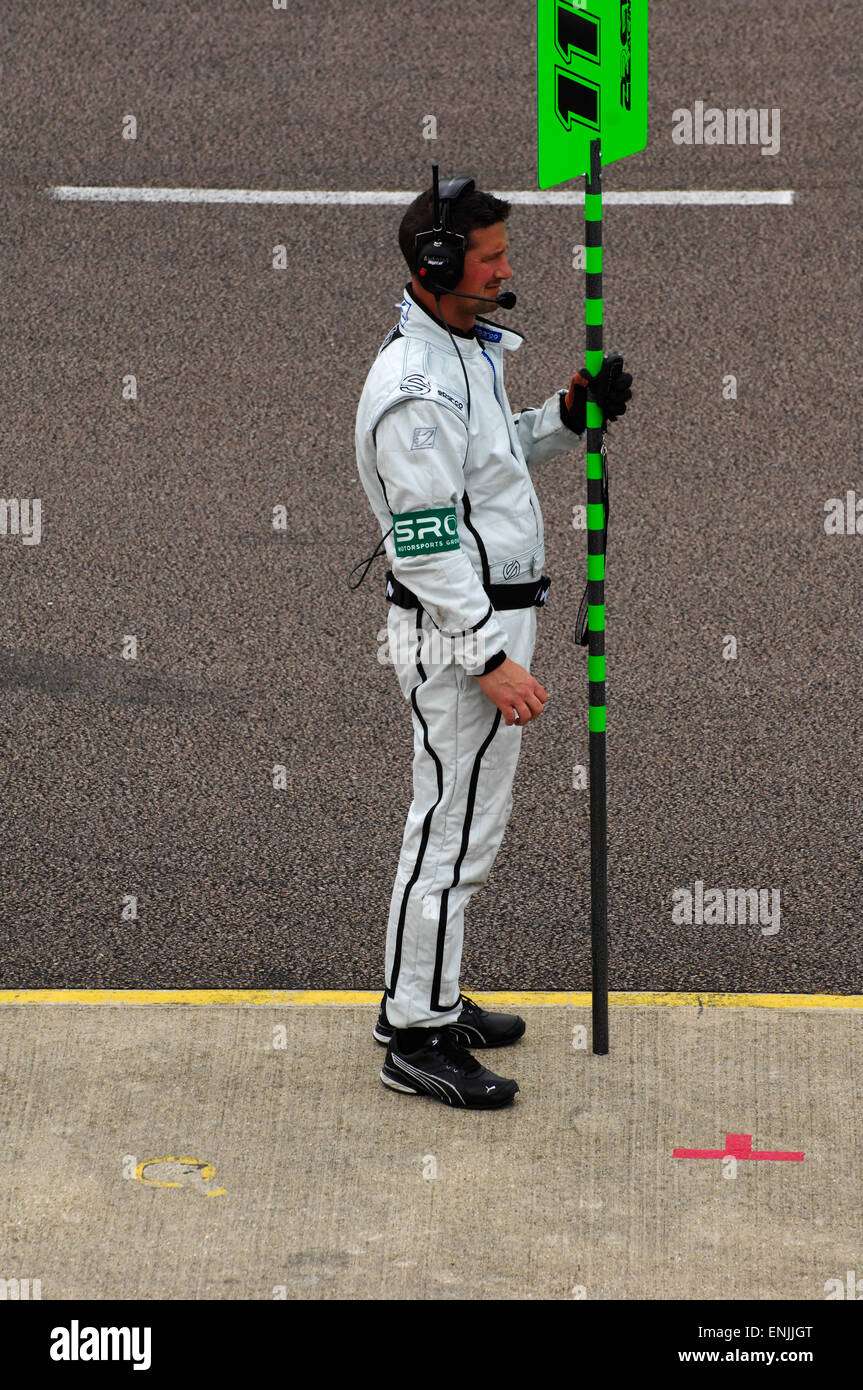 Pit crew service mechanic Stock Photo - Alamy