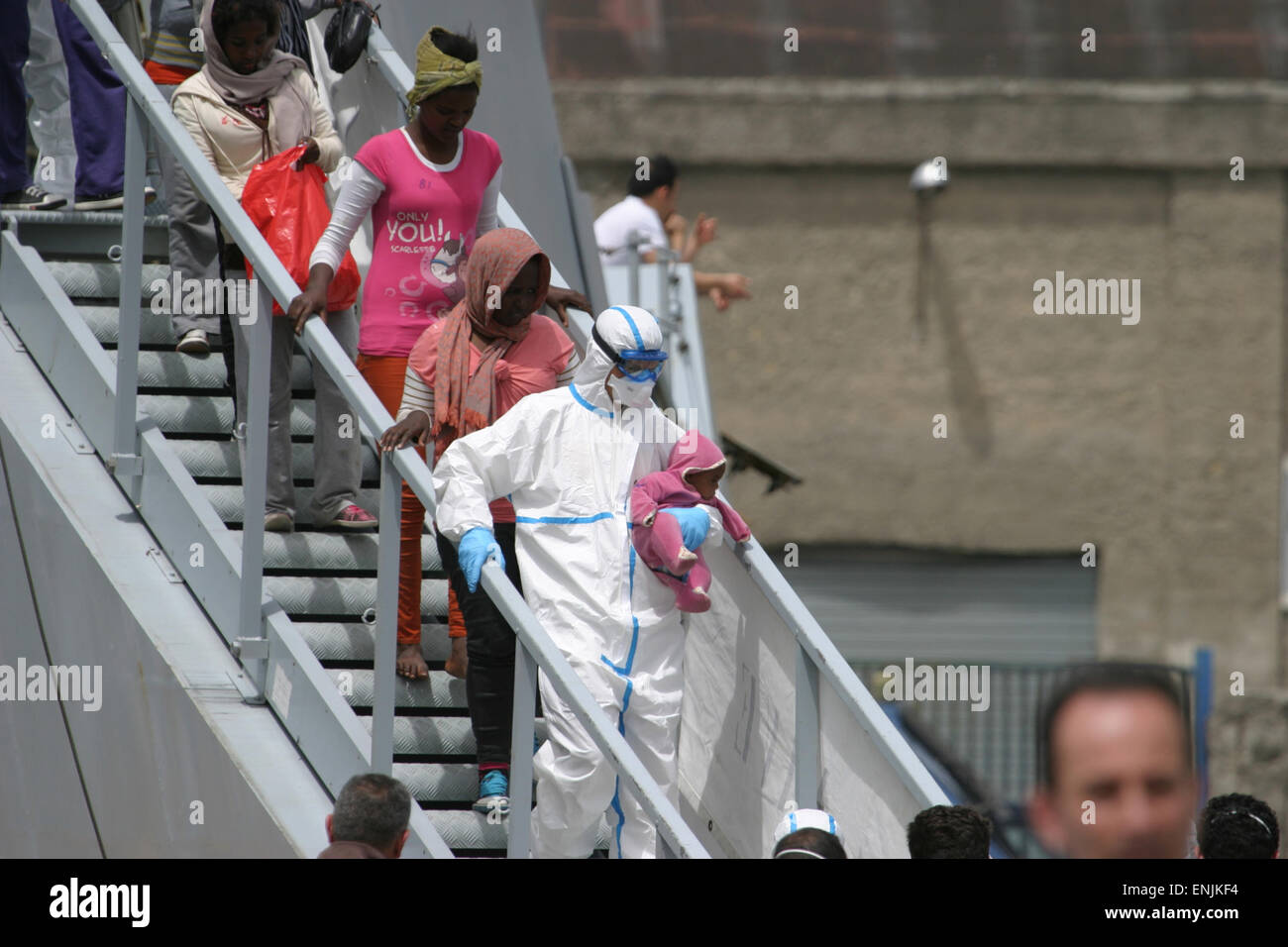 Naples, Italy. 06th May, 2015. Immigrants arrive at the port of Naples ...