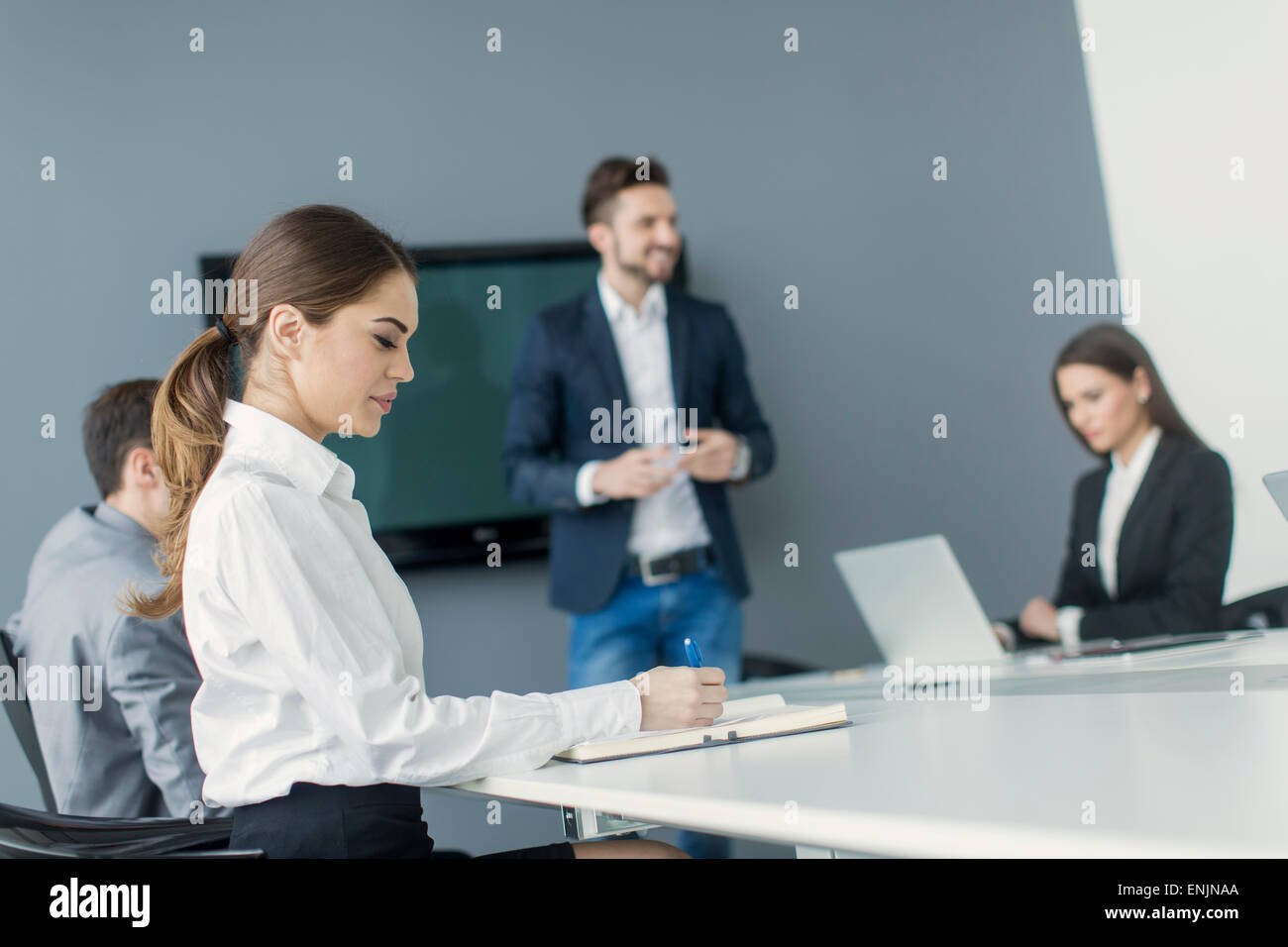 Young people in the office Stock Photo - Alamy