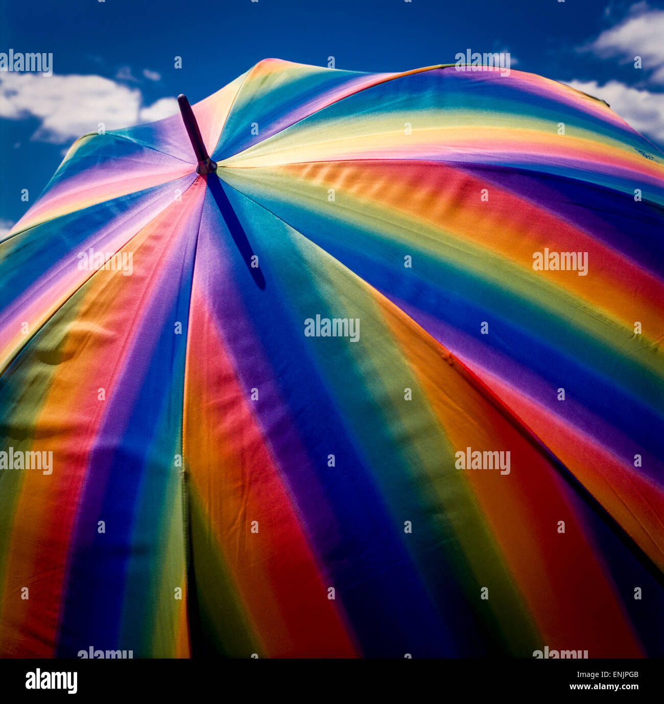 Colorful umbrella, blue sky background Stock Photo - Alamy Colorful umbrella, blue sky background Stock Photo - Alamy