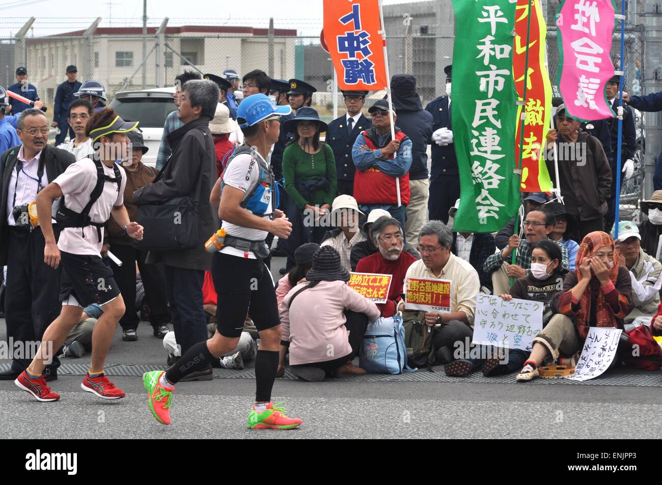 Okinawa, Japan: people protesting against the construction of a new ...