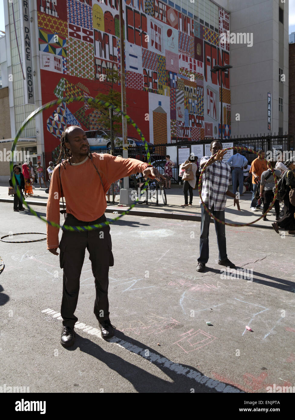 People with hula hoops at The Dance Africa Festival in the Fort Greene ...