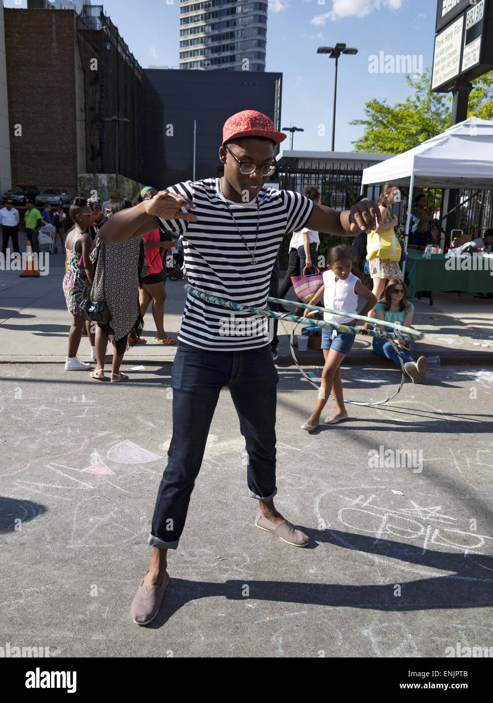 People with hula hoops at The Dance Africa Festival in the Fort Greene ...