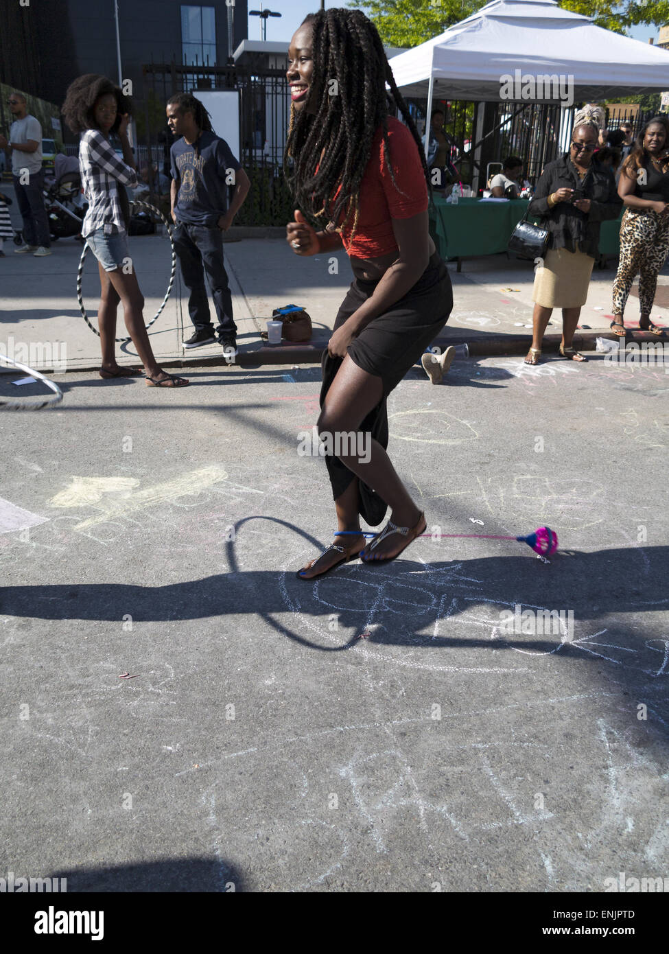 People with hula hoops at The Dance Africa Festival in the Fort Greene ...