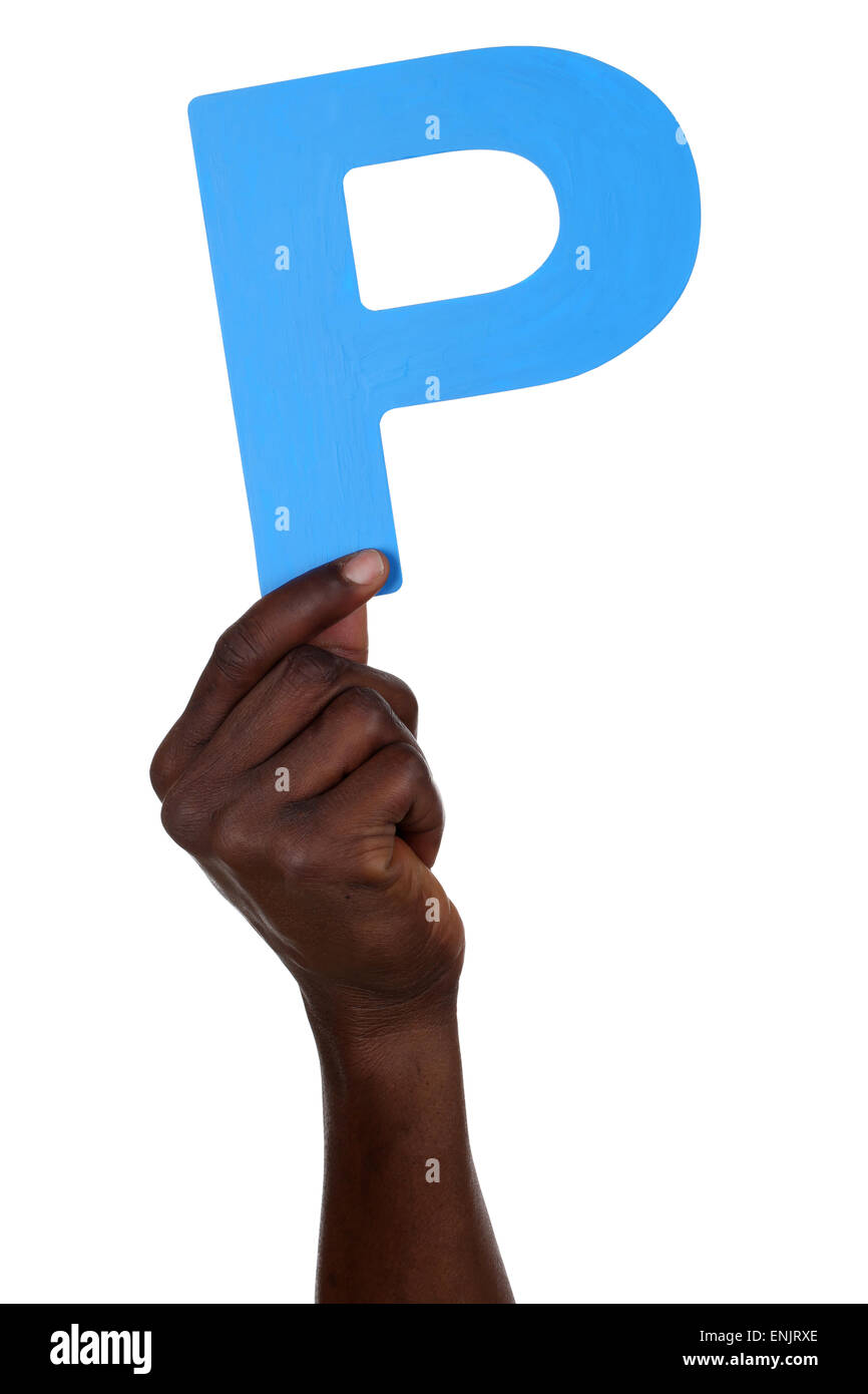 Hand holding letter P from alphabet isolated on a white background ...