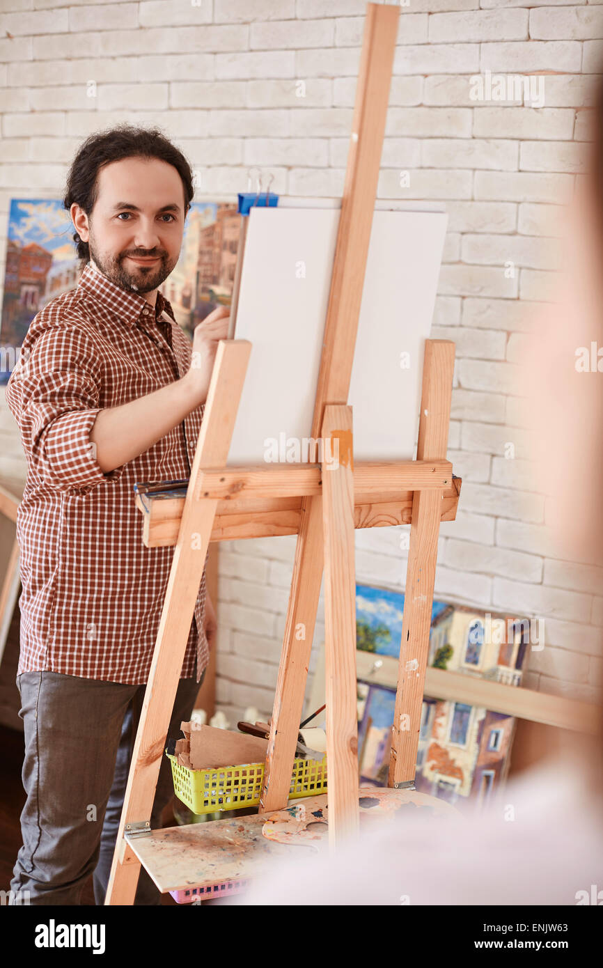Young man drawing muse in studio Stock Photo - Alamy
