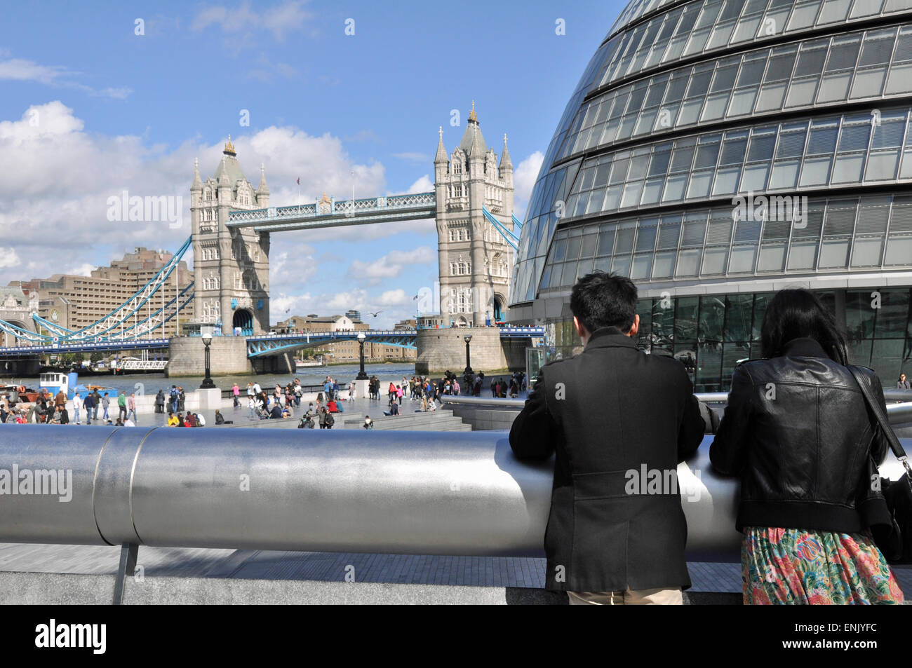 People looking at Tower Bridge and the City Hall from 'The Scoop ...