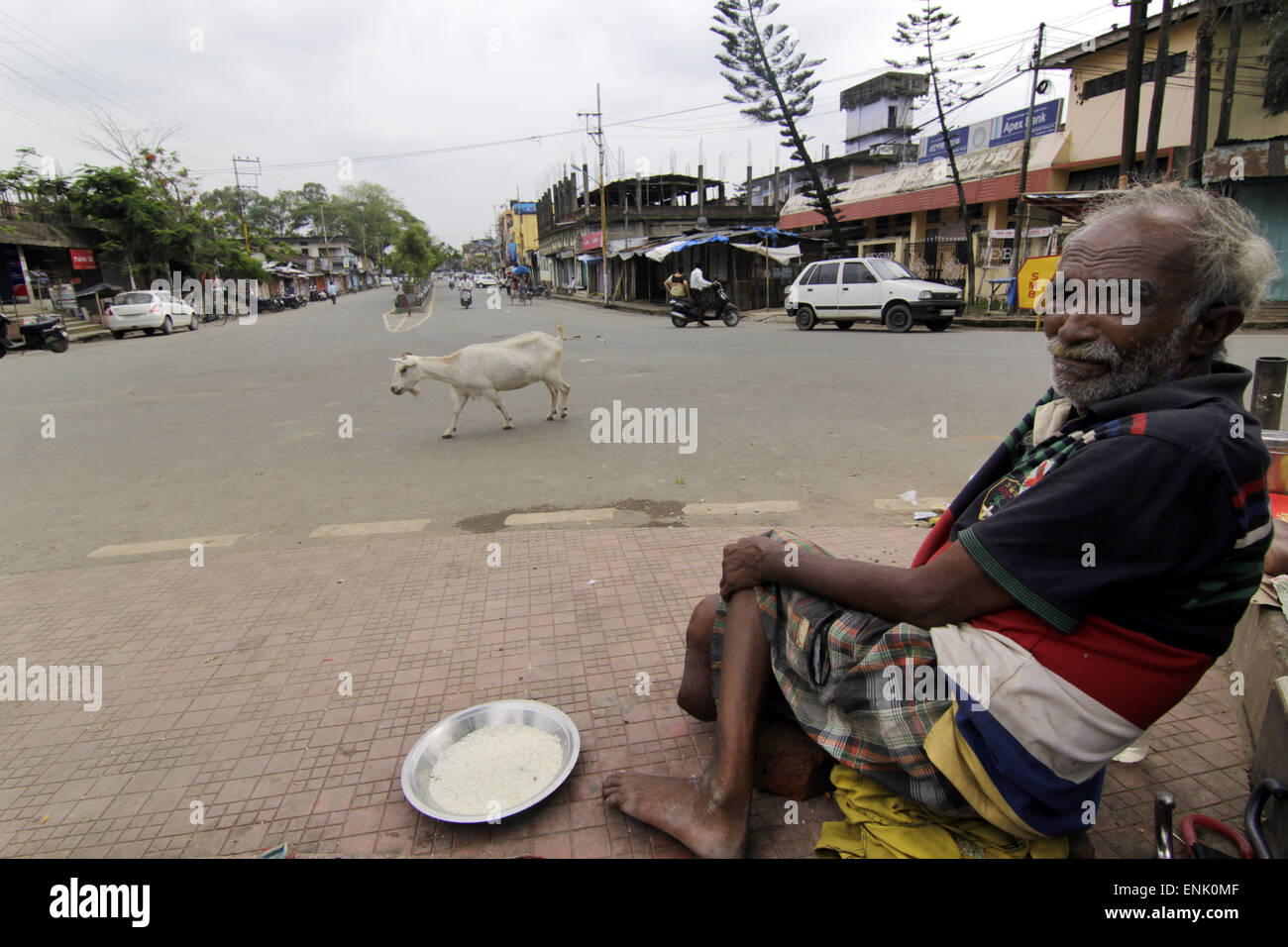 Sivasagar, Assam, India. 7th May, 2015. An Indian homeless handicapped ...