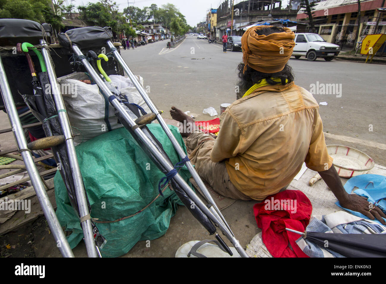Sivasagar, Assam, India. 7th May, 2015. An Indian homeless handicapped ...