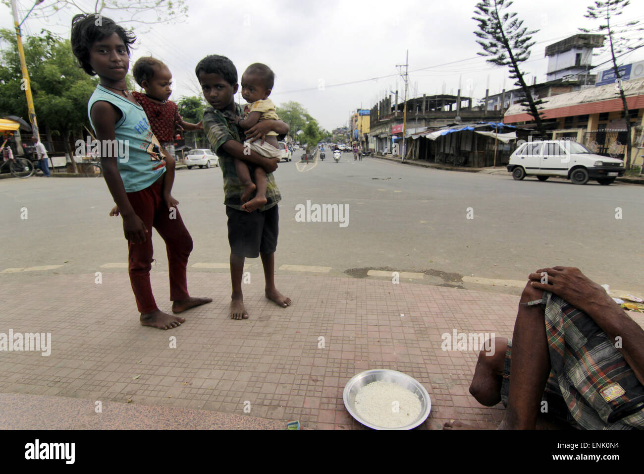 Sivasagar, Assam, India. 7th May, 2015. An Indian homeless handicapped ...