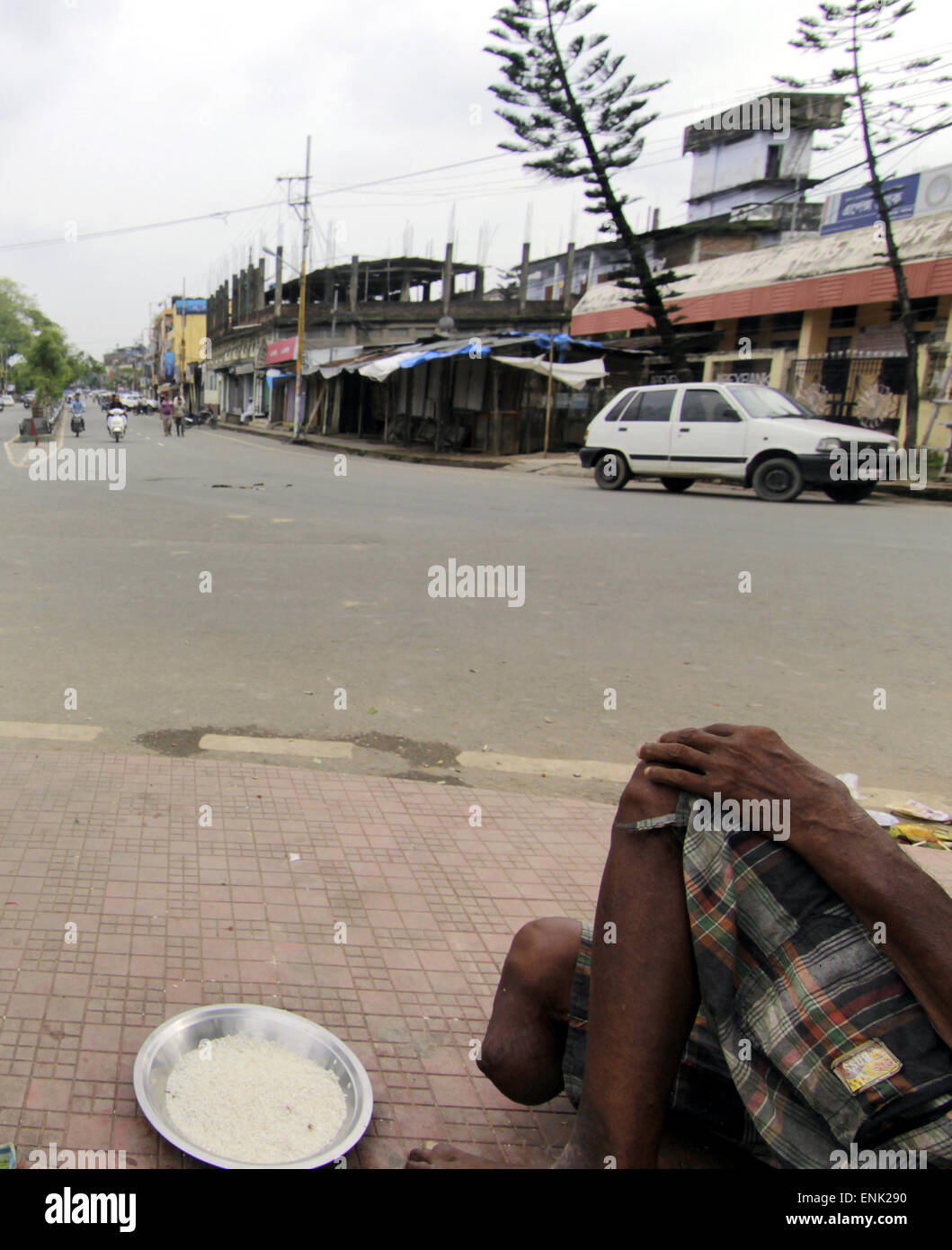 Sivasagar, Assam, India. 7th May, 2015. An Indian homeless handicapped ...