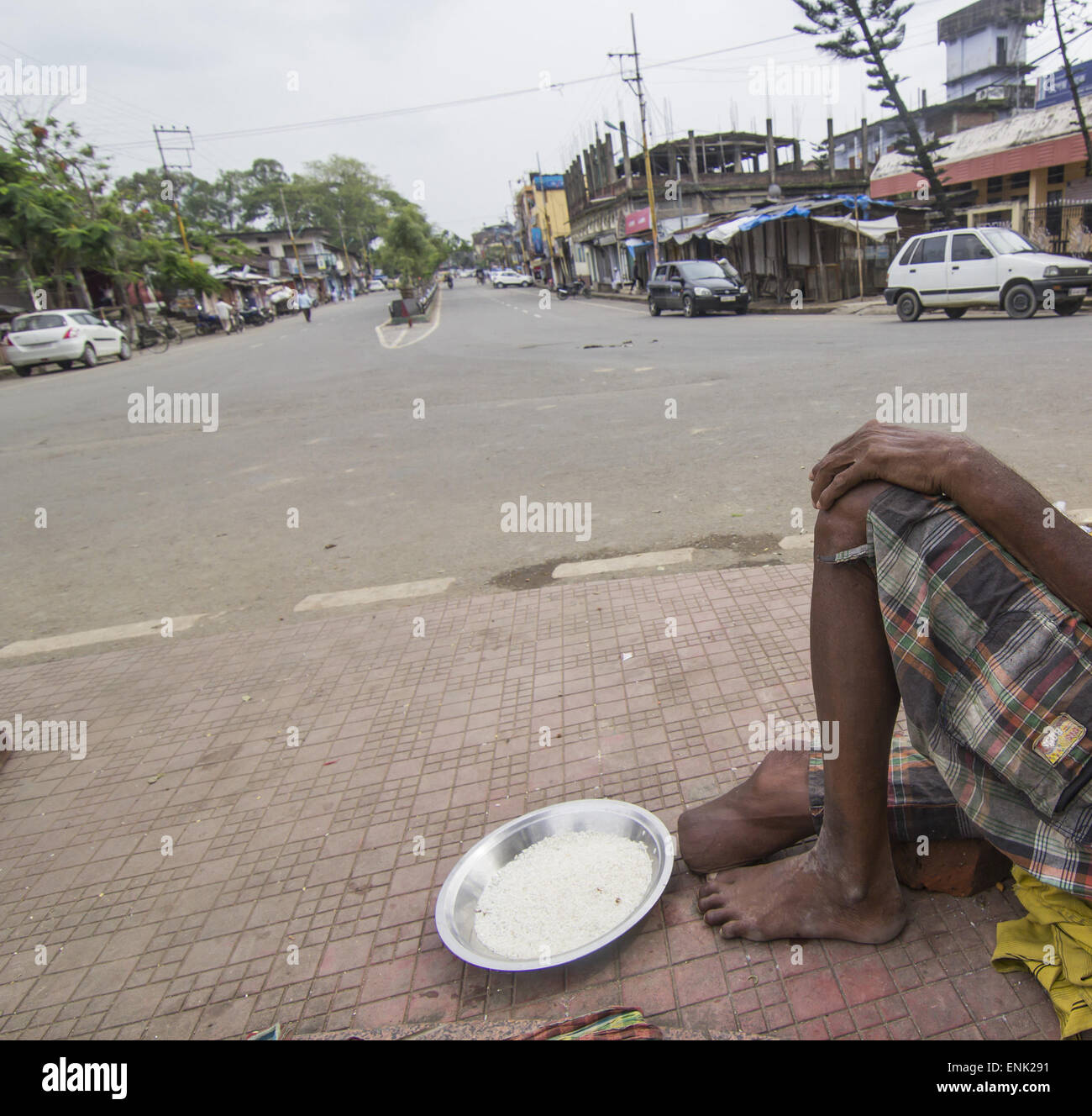 Sivasagar, Assam, India. 7th May, 2015. An Indian homeless handicapped ...