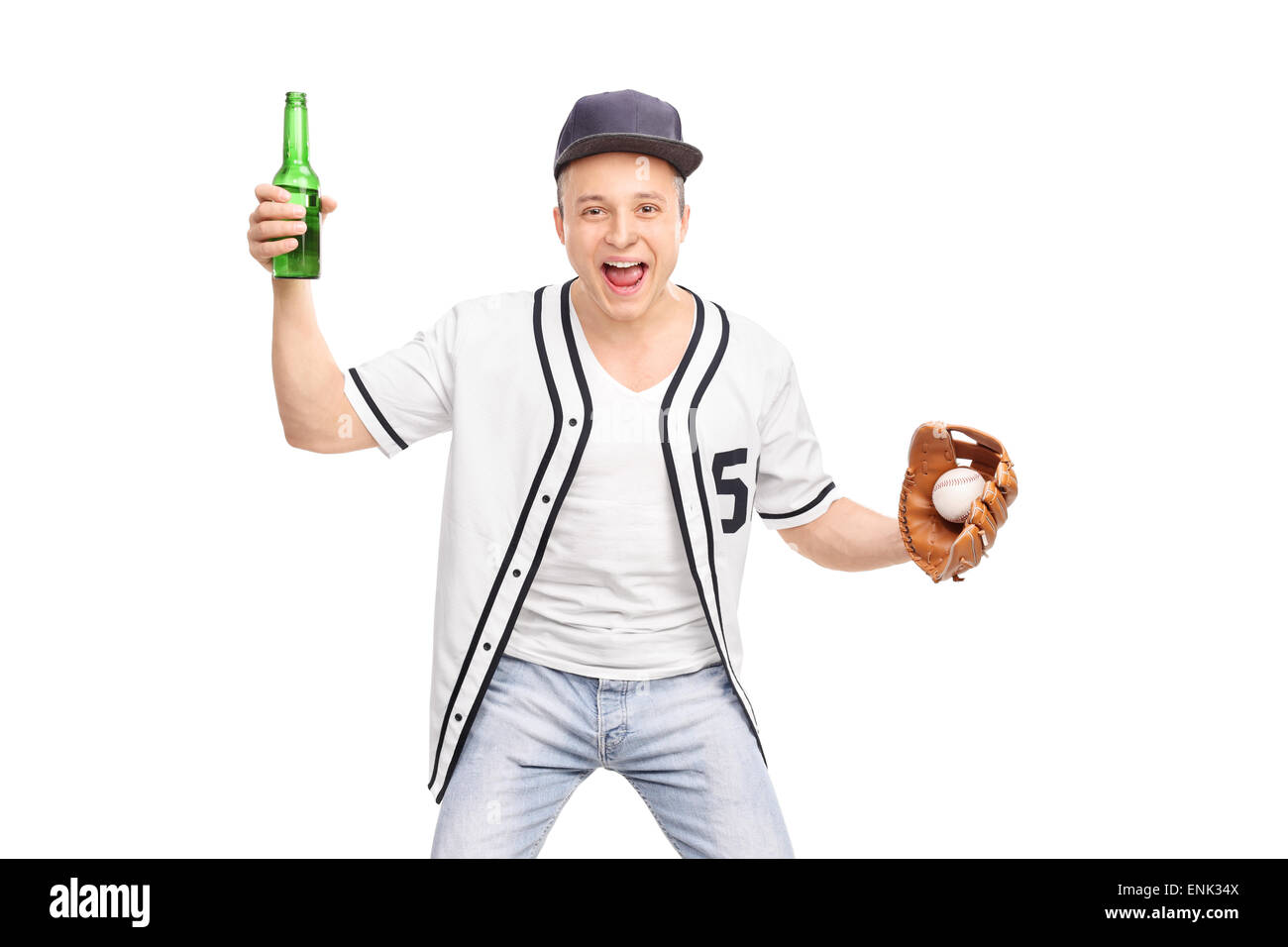 Excited guy in a white baseball shirt holding a beer in one hand and a ...