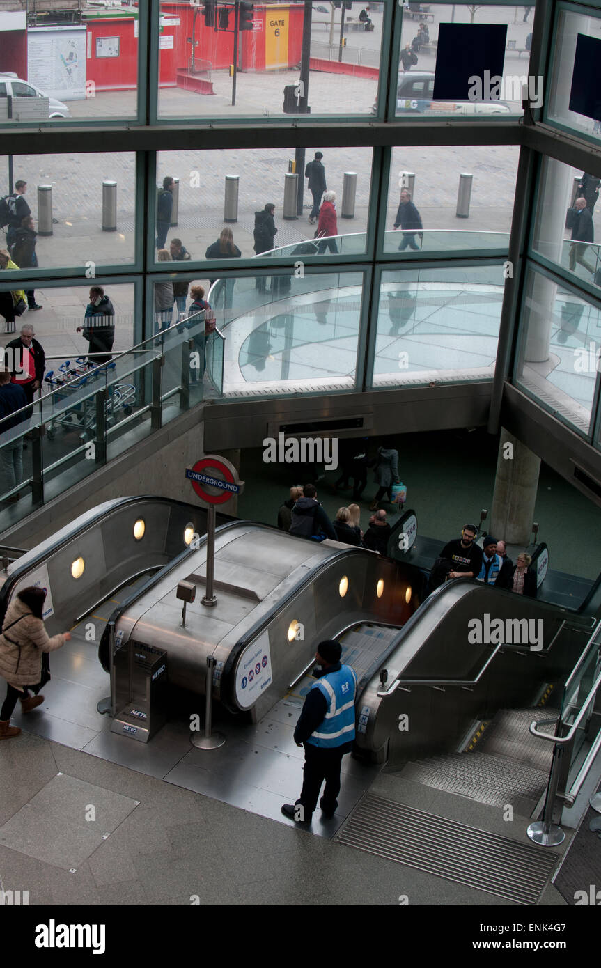 Kings cross station escalators hi-res stock photography and images - Alamy