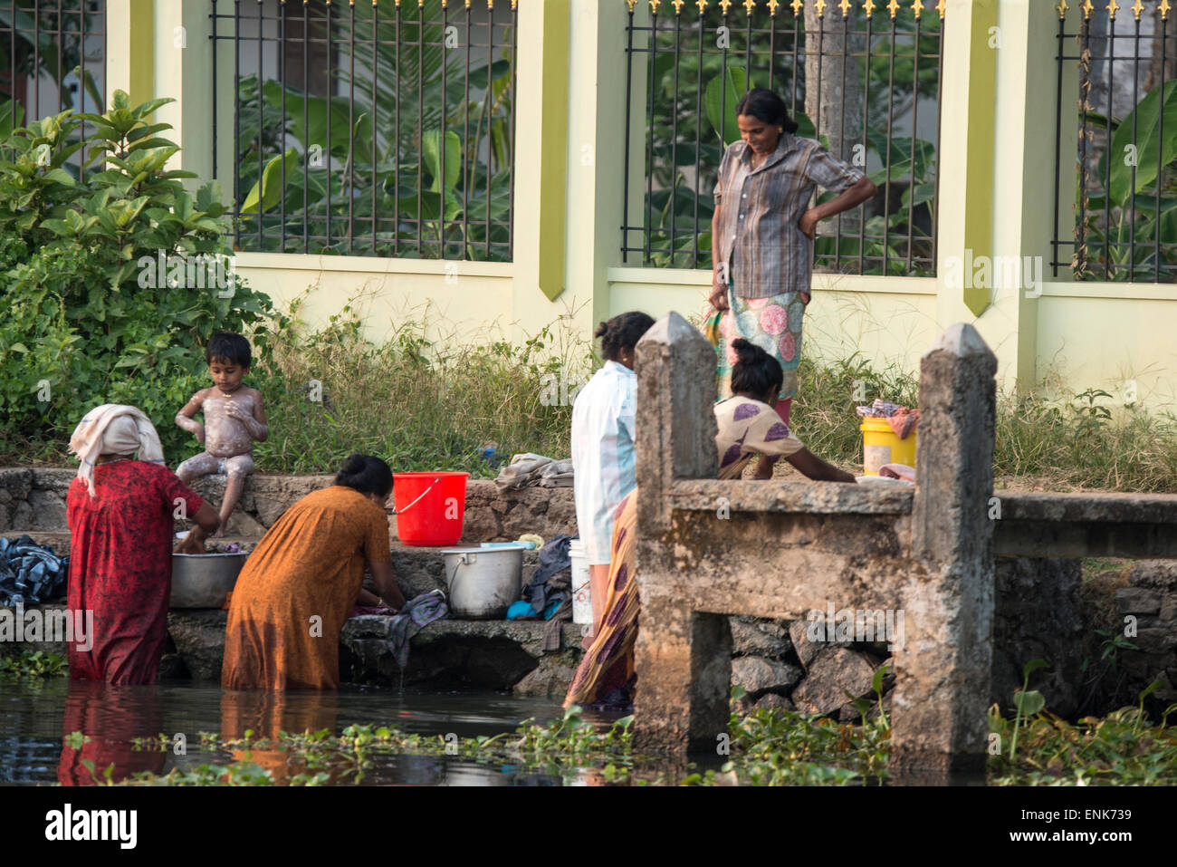 Indian woman washing clothes hi-res stock photography and images - Alamy