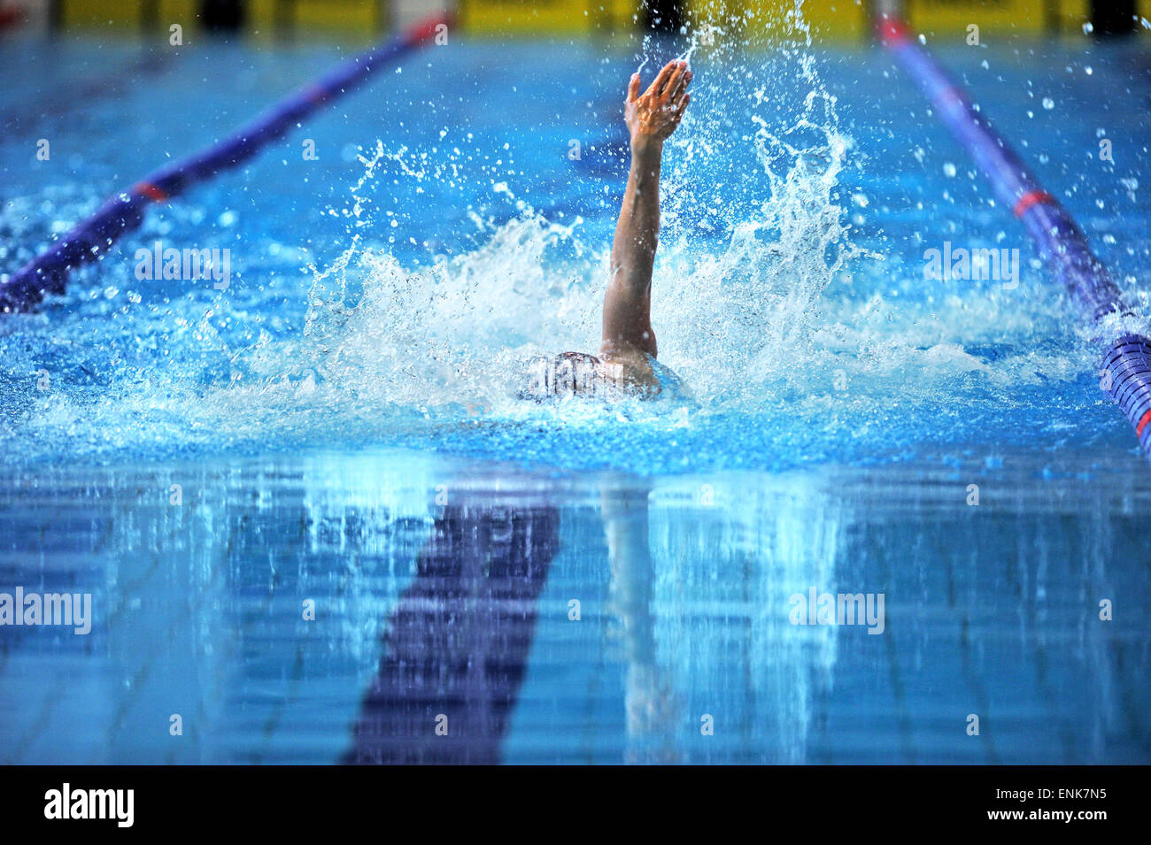 Young man swimming backstroke Stock Photo - Alamy