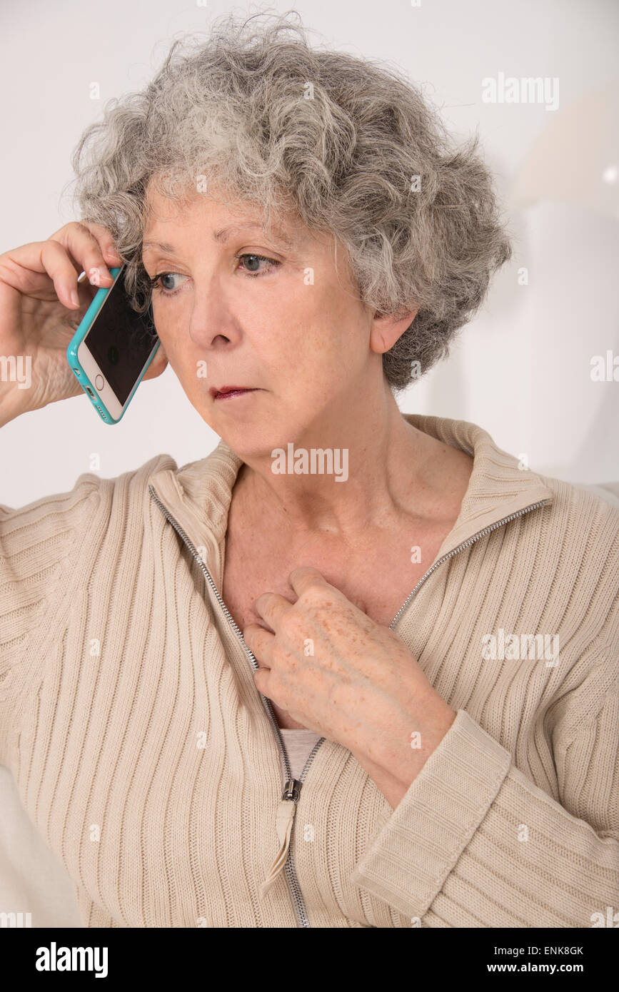 Elderly person on the phone Stock Photo - Alamy