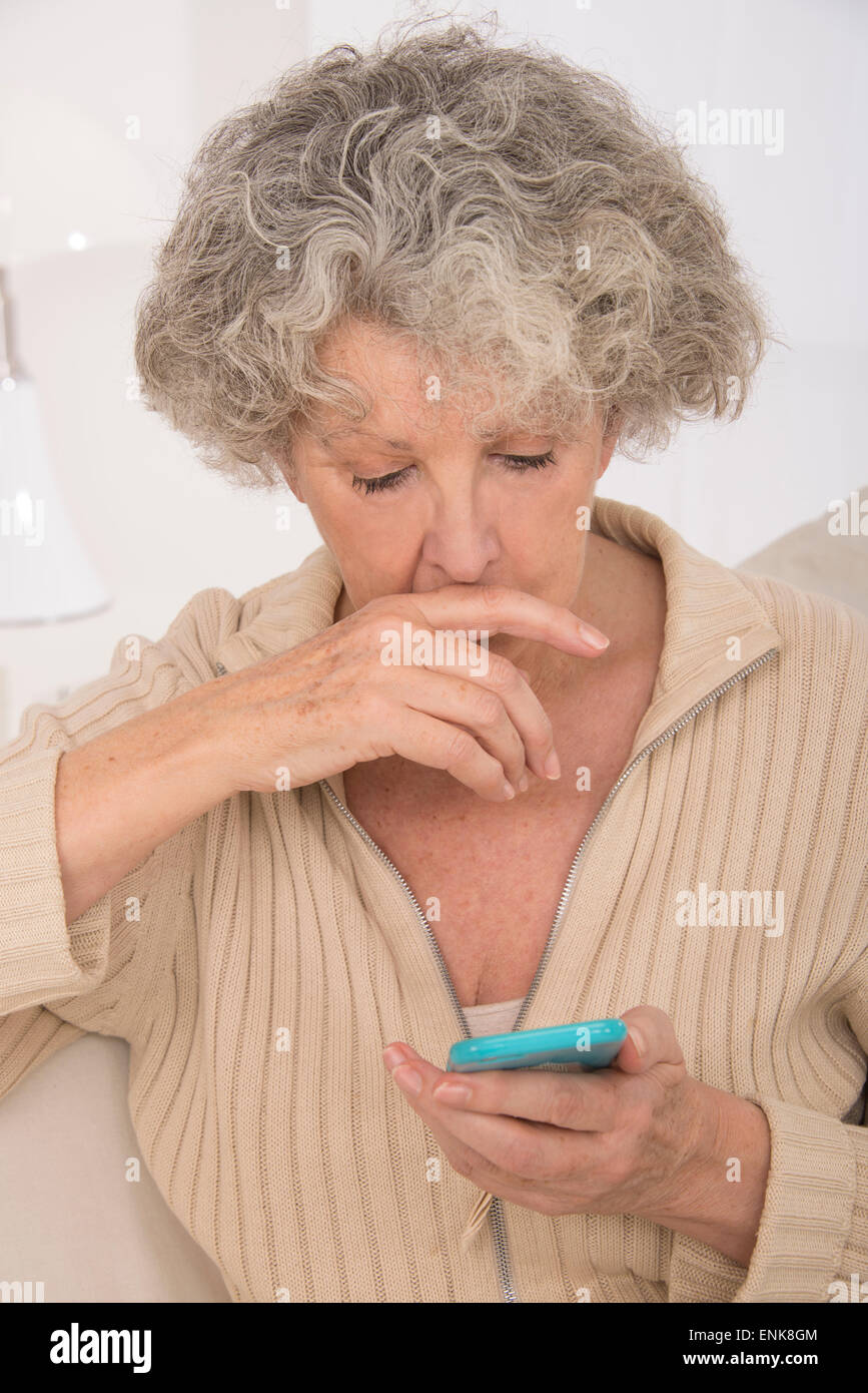 Elderly person with phone Stock Photo - Alamy