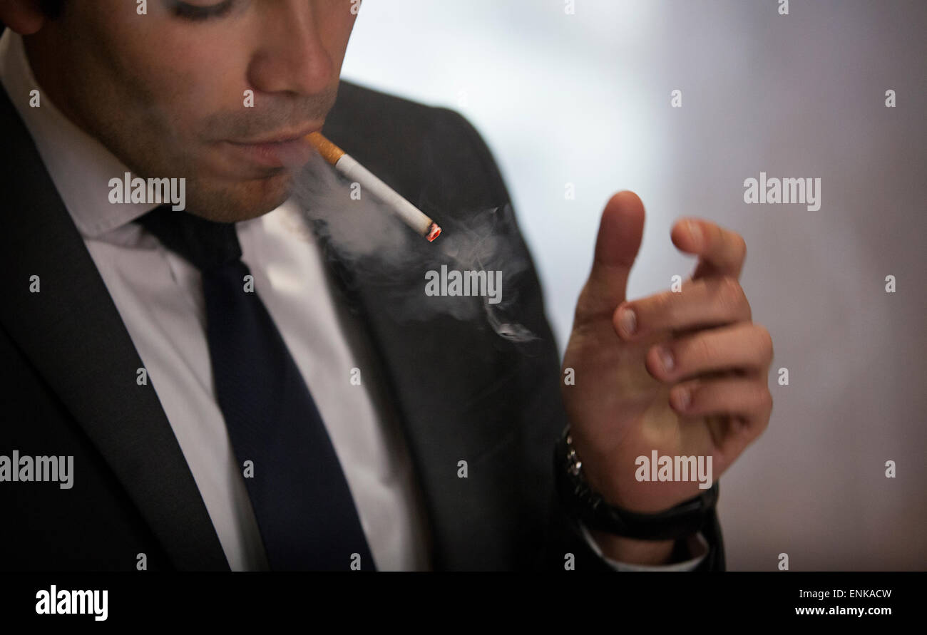 Caucasian men smoking outdoor hi-res stock photography and images - Alamy