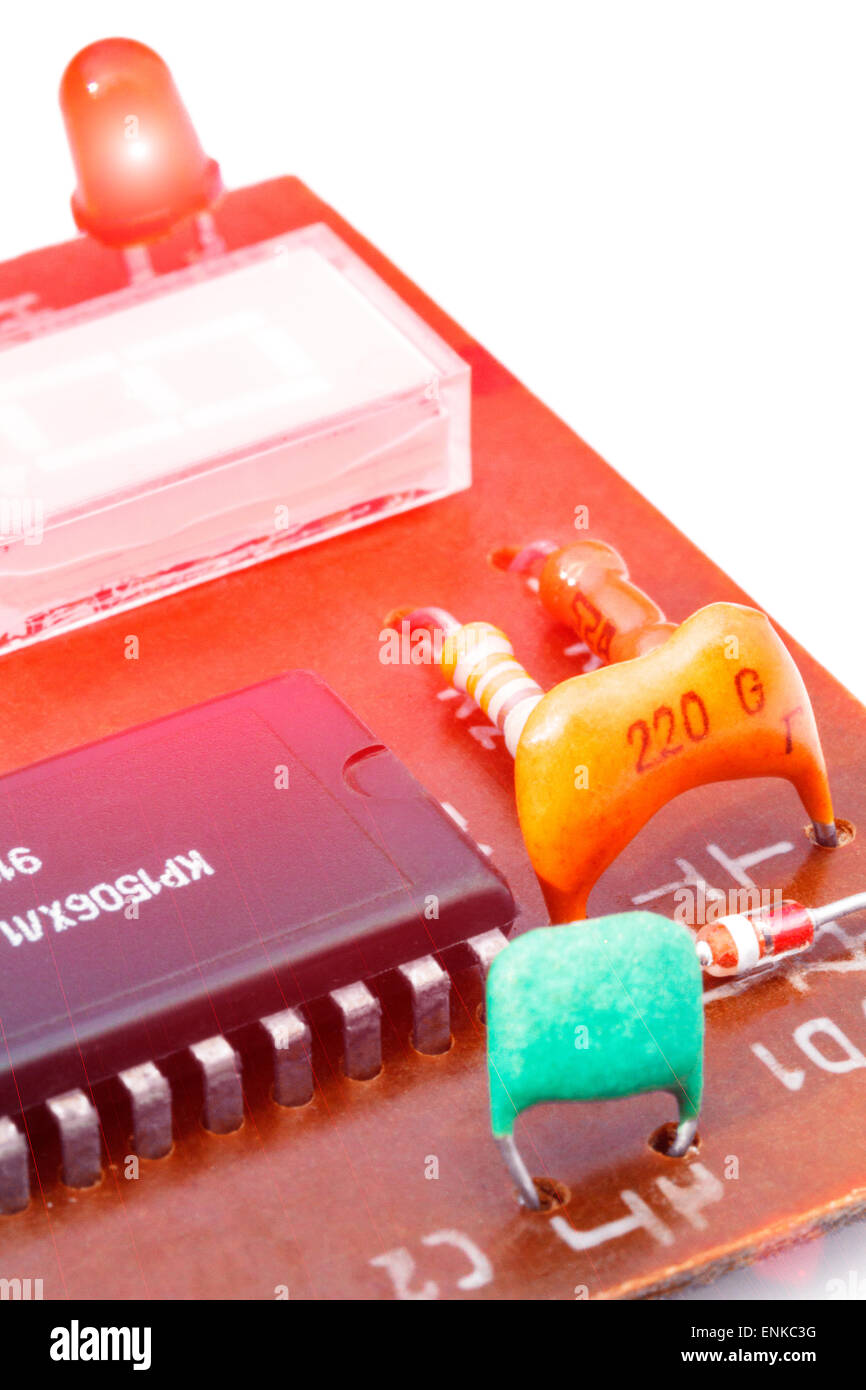 Close up of electronic components on a obsolete printed-circuit board ...